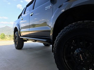 Toyota Hilux N70 ANGLED Rock Sliders / Side Steps - P/C Ally Checkerpl ...